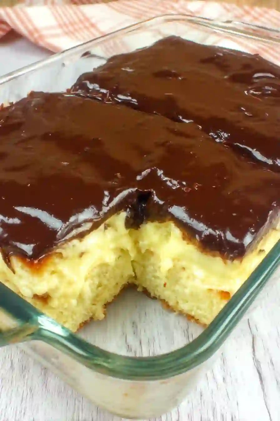 Boston Cream Pie Poke Cake – Easy Creamy Bakery Classic